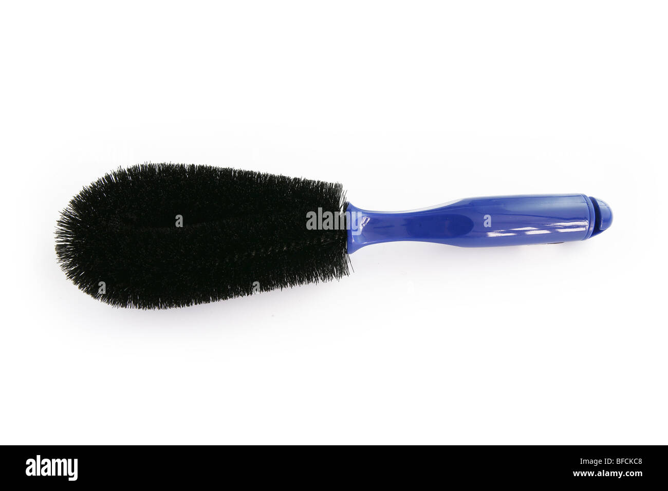 Small anti-static duster on white background Stock Photo - Alamy