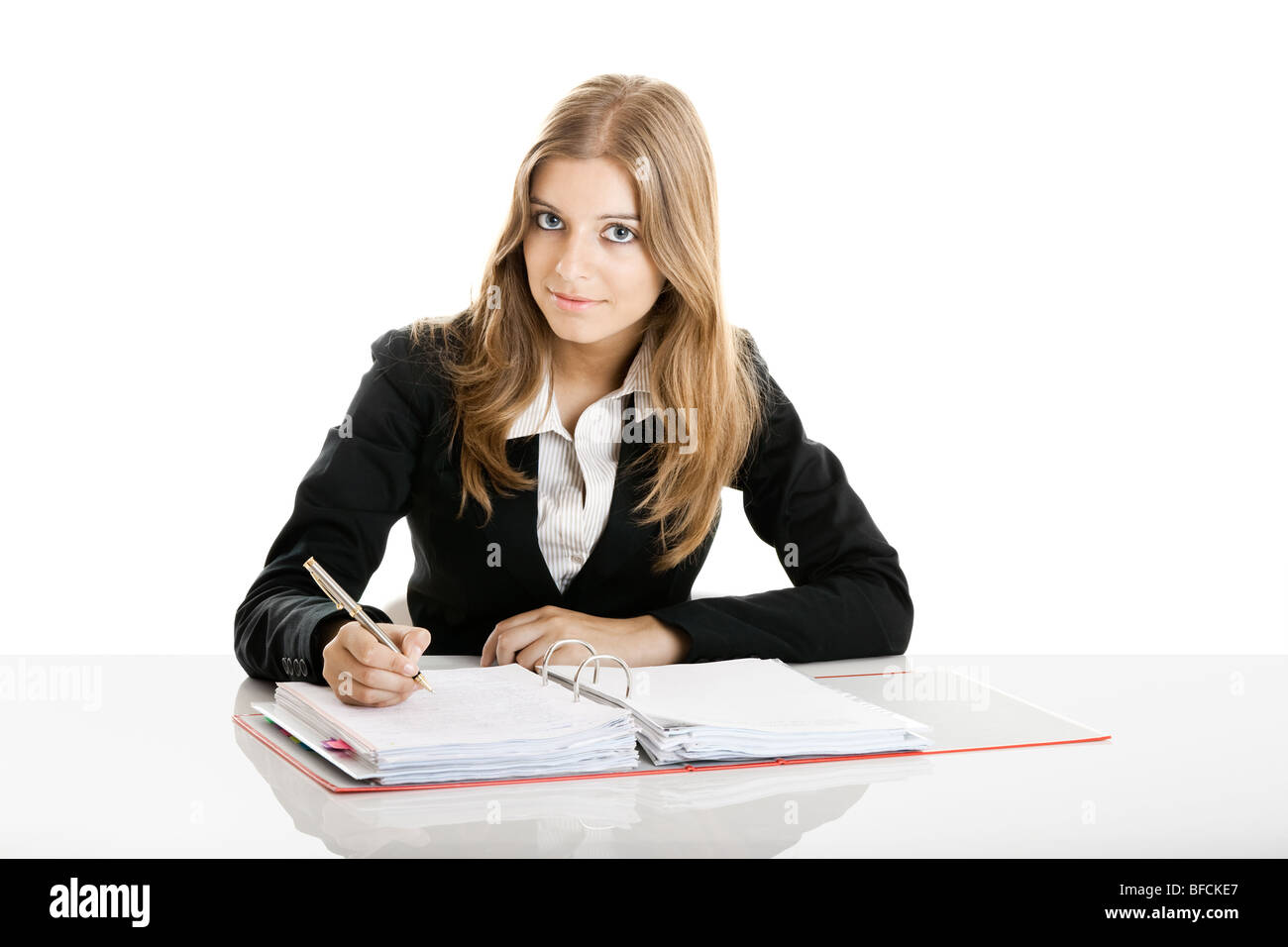Portrait of a beautiful business woman in the office doing some ...