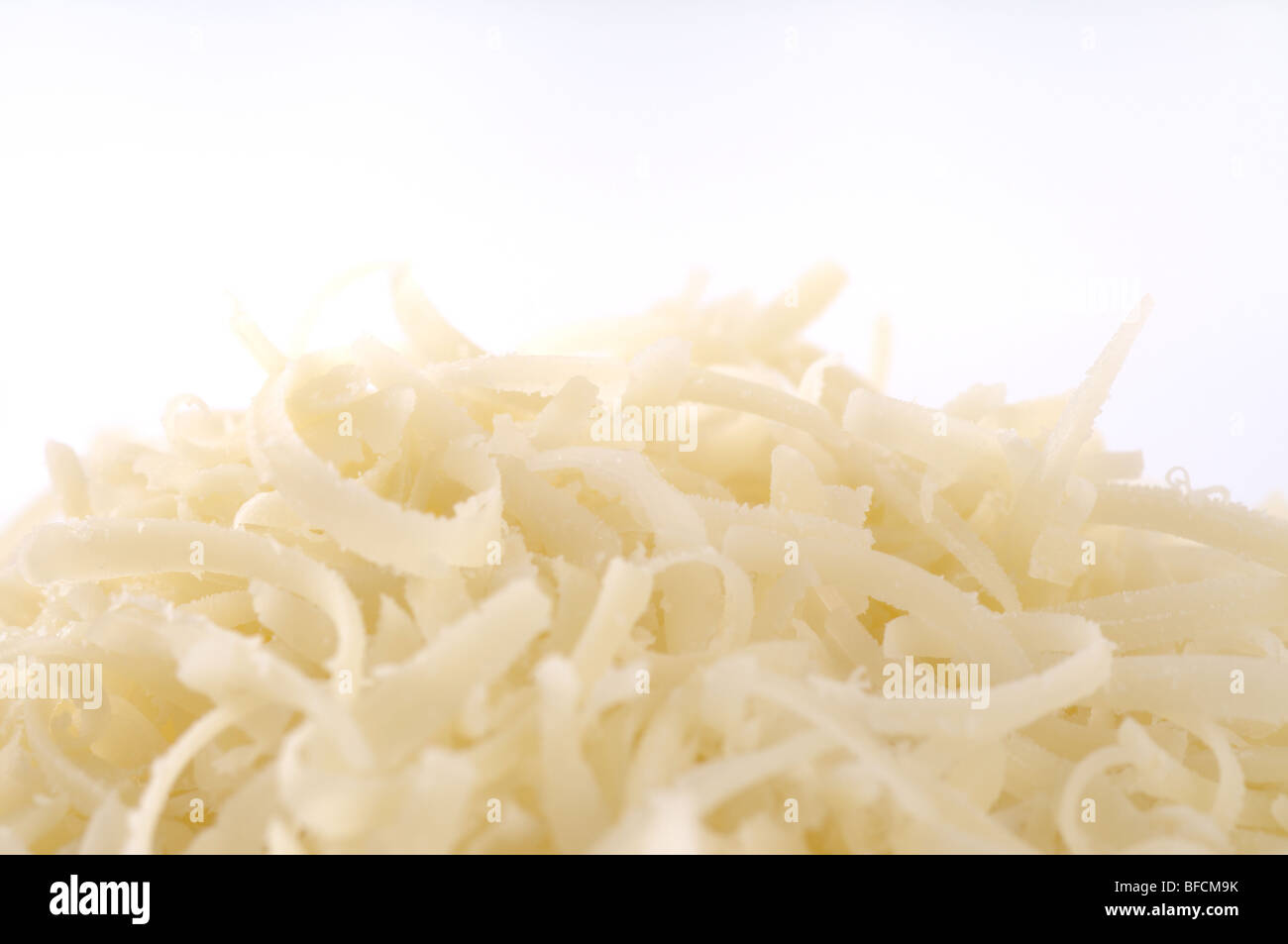 Parmesan cheese on white background Stock Photo - Alamy
