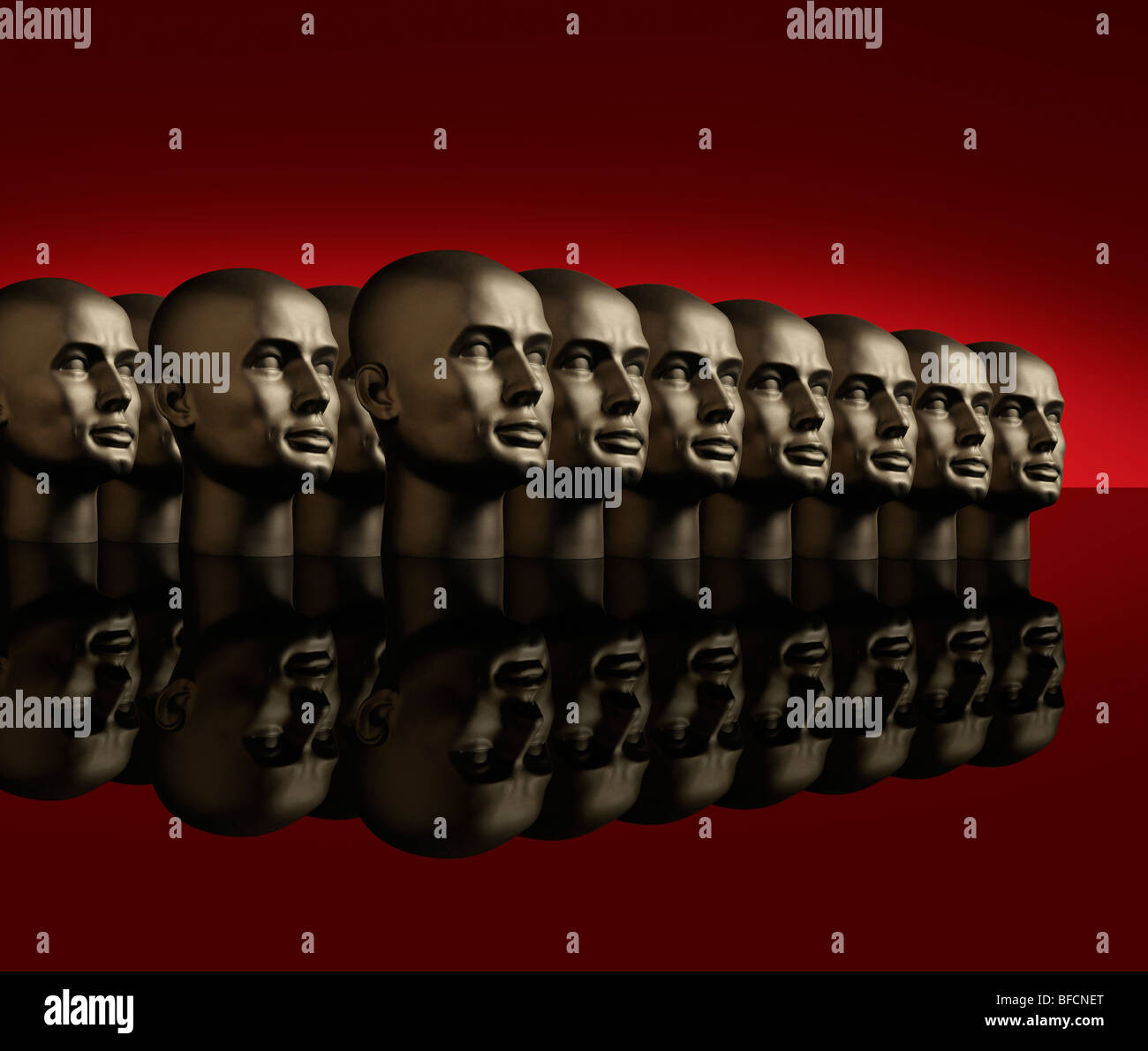Metallic android mannequin heads lined up in several rows on a ...