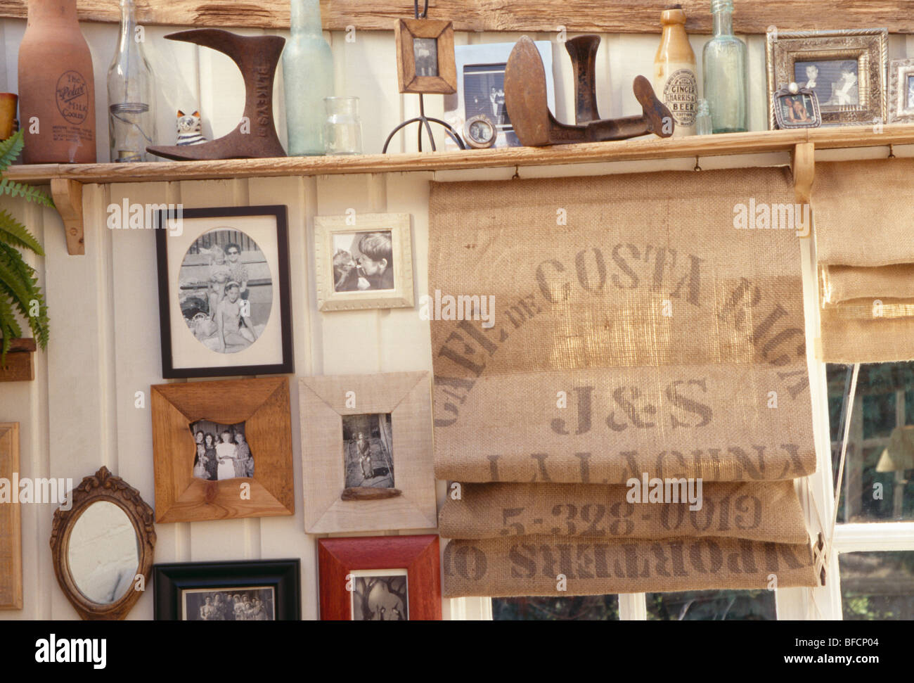 Close-up of blind made from old jute coffee sacks in small cottage hall ...