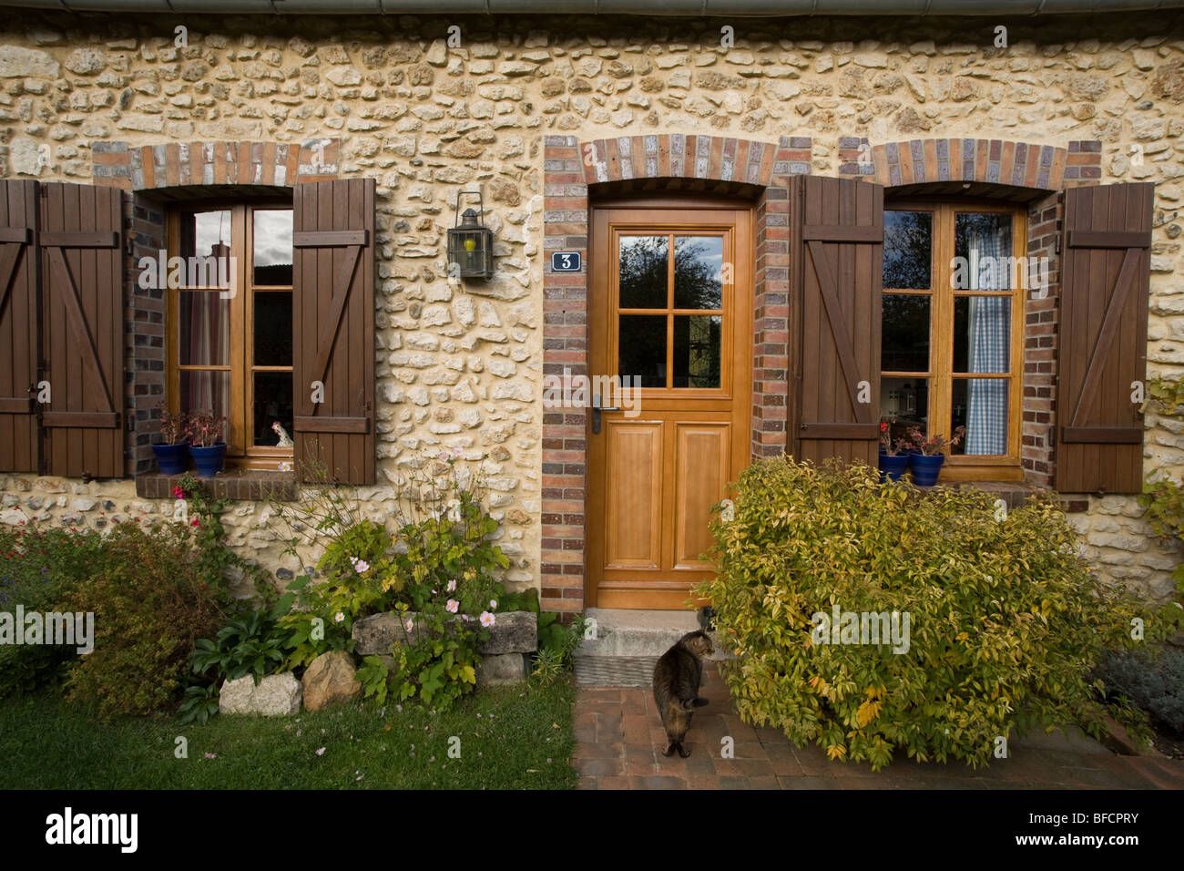 front of village house Stock Photo - Alamy