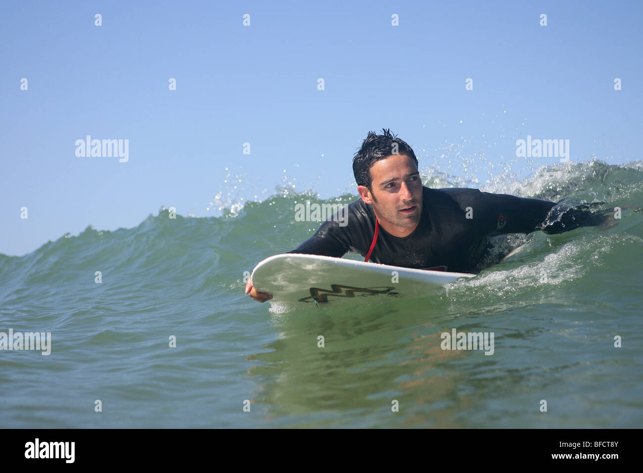 Man surfing wave Stock Photo - Alamy