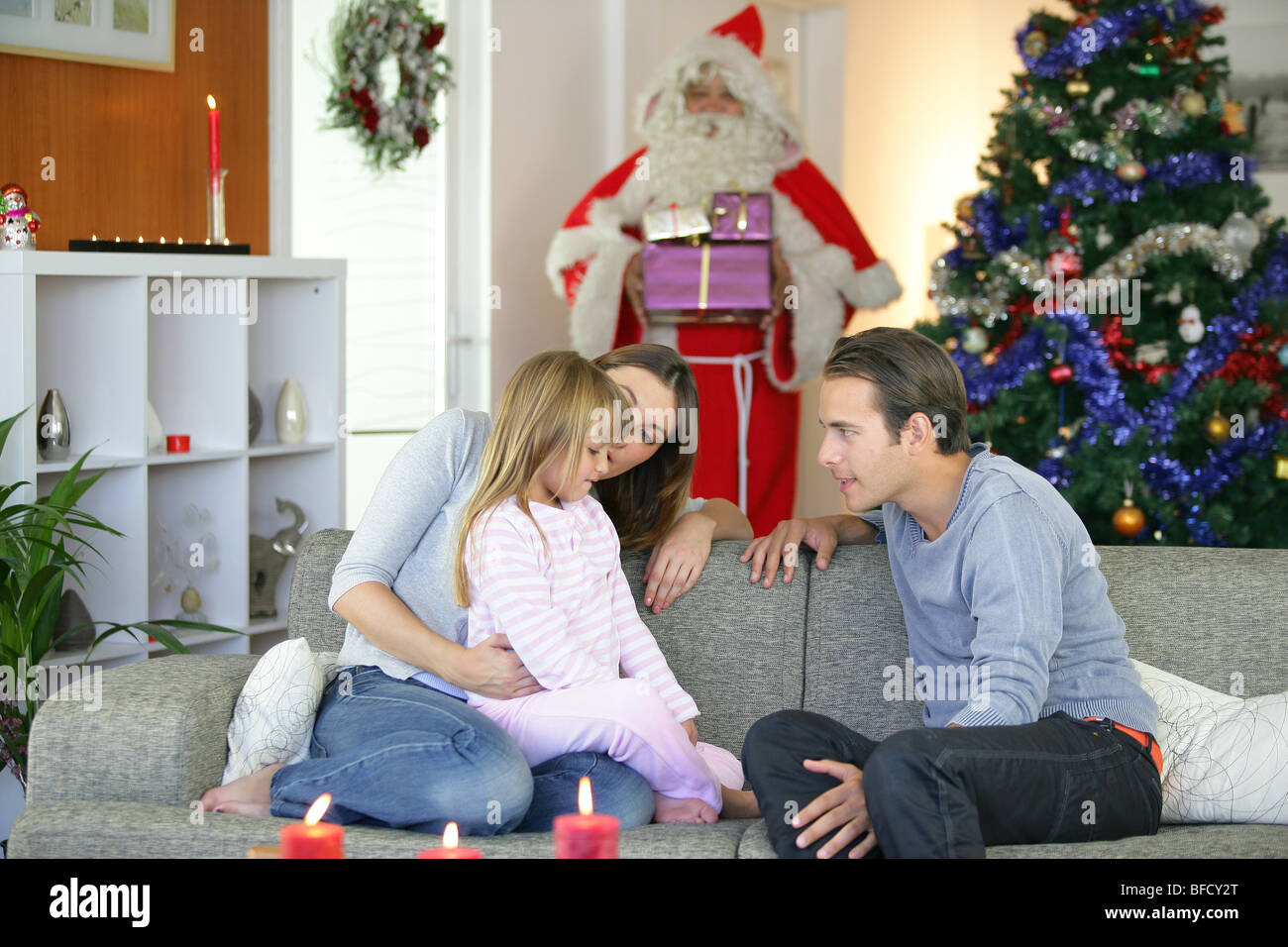 Parents talking to their child about Christmas traditions Stock Photo ...