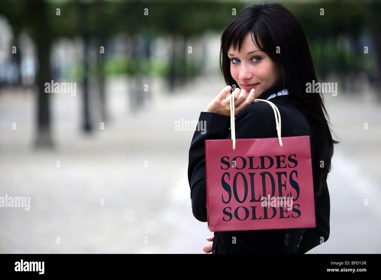 Woman shopping during day-trip to city Stock Photo - Alamy