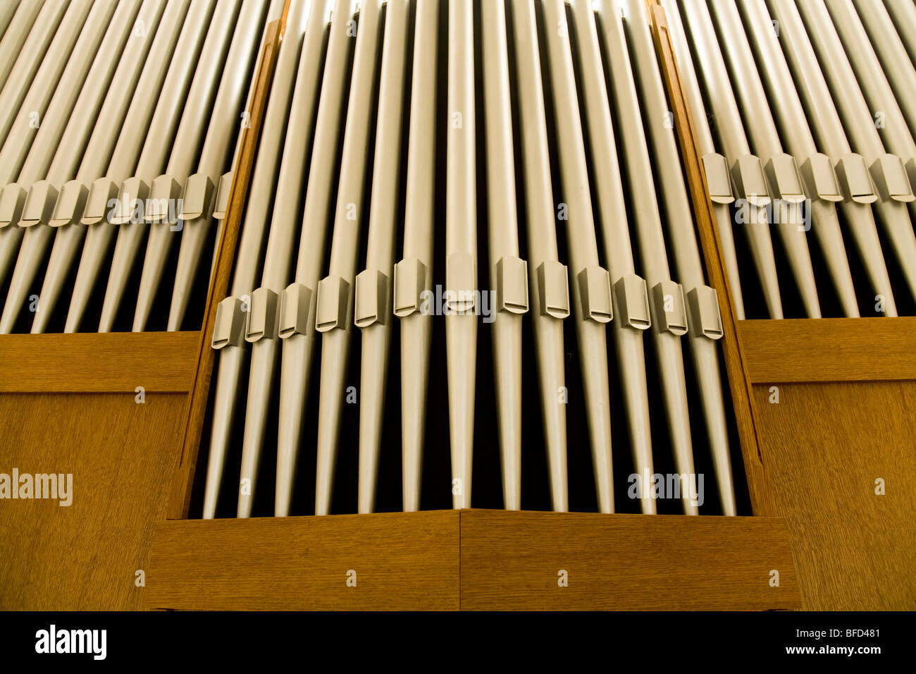 Modern organ pipes inside a new Catholic Church in a Polish residential ...