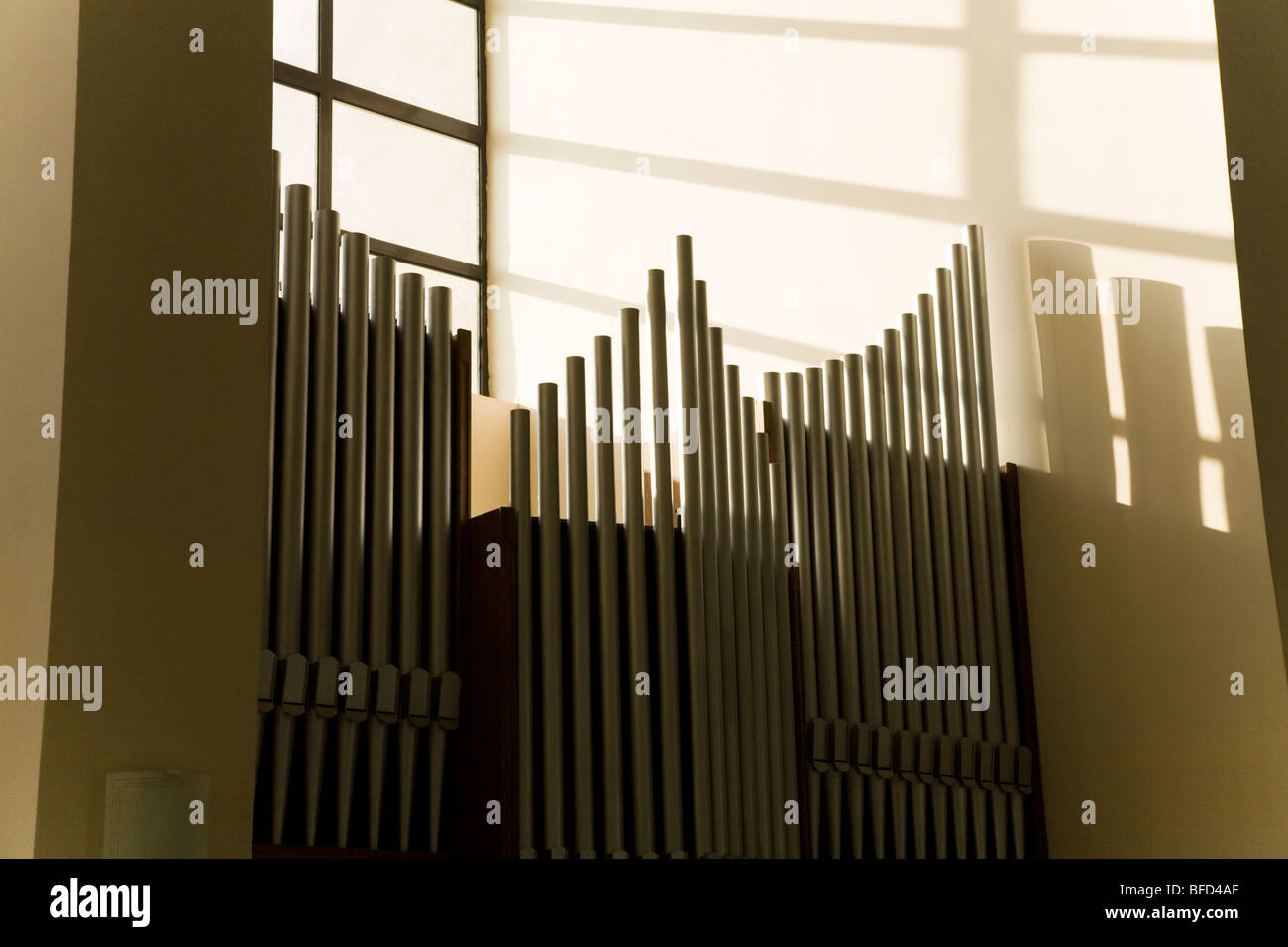 Modern organ pipes inside a new Catholic Church in a Polish residential ...