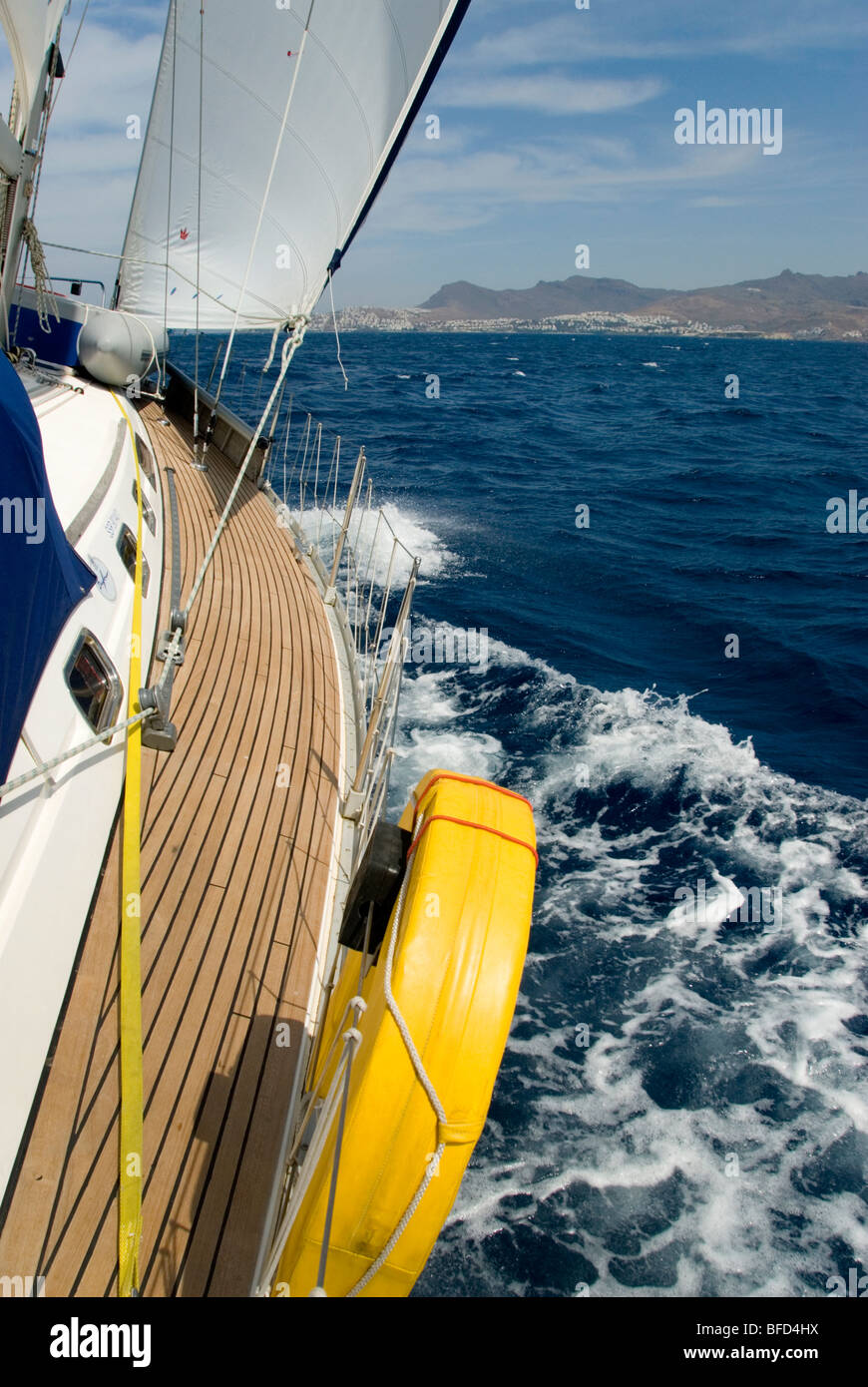 Yacht on port tack, heeled over, sailing up Bodrum / Kos Channel ...