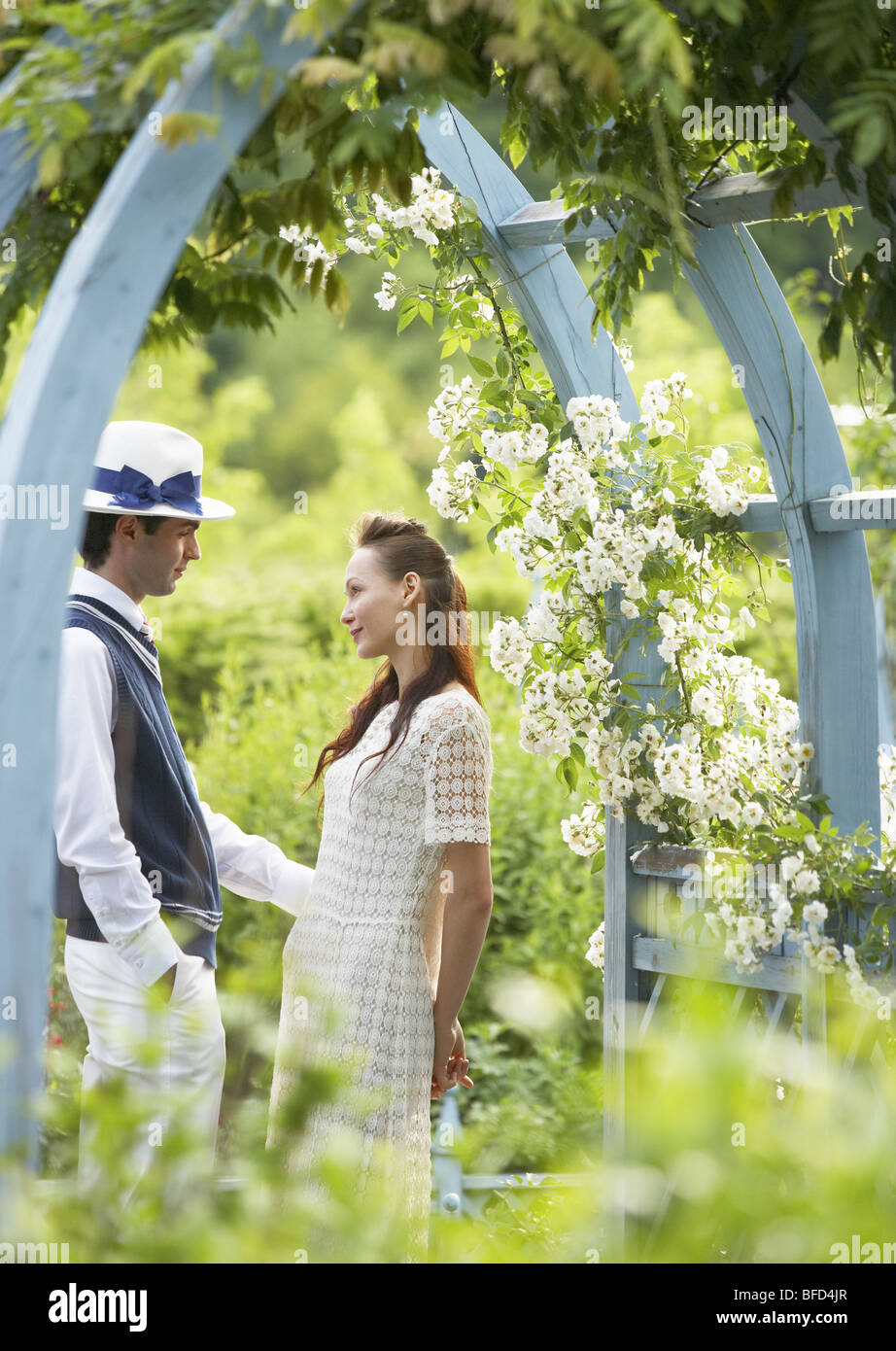 Couple facing each other Stock Photo - Alamy