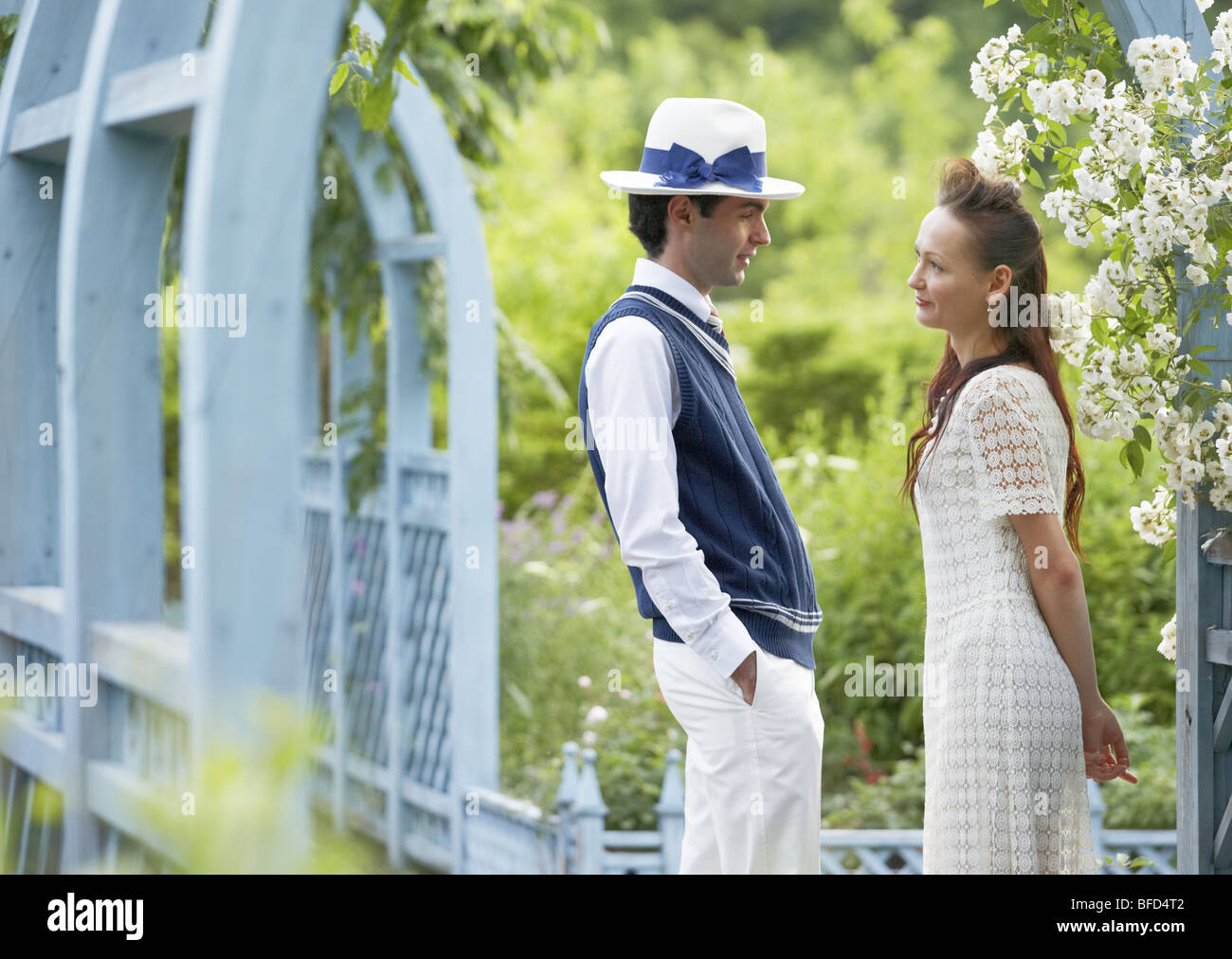 Couple facing each other Stock Photo - Alamy