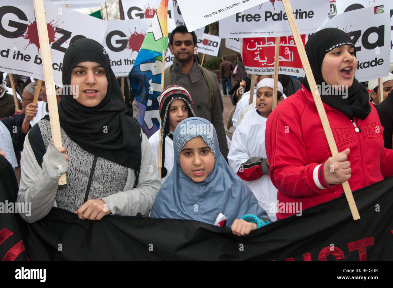 South London March for Palestine. Young Muslim women and girl hold ...