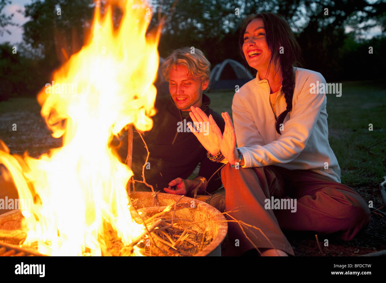 A couple enjoy a campfire in Everglades National Park, Florida Stock ...