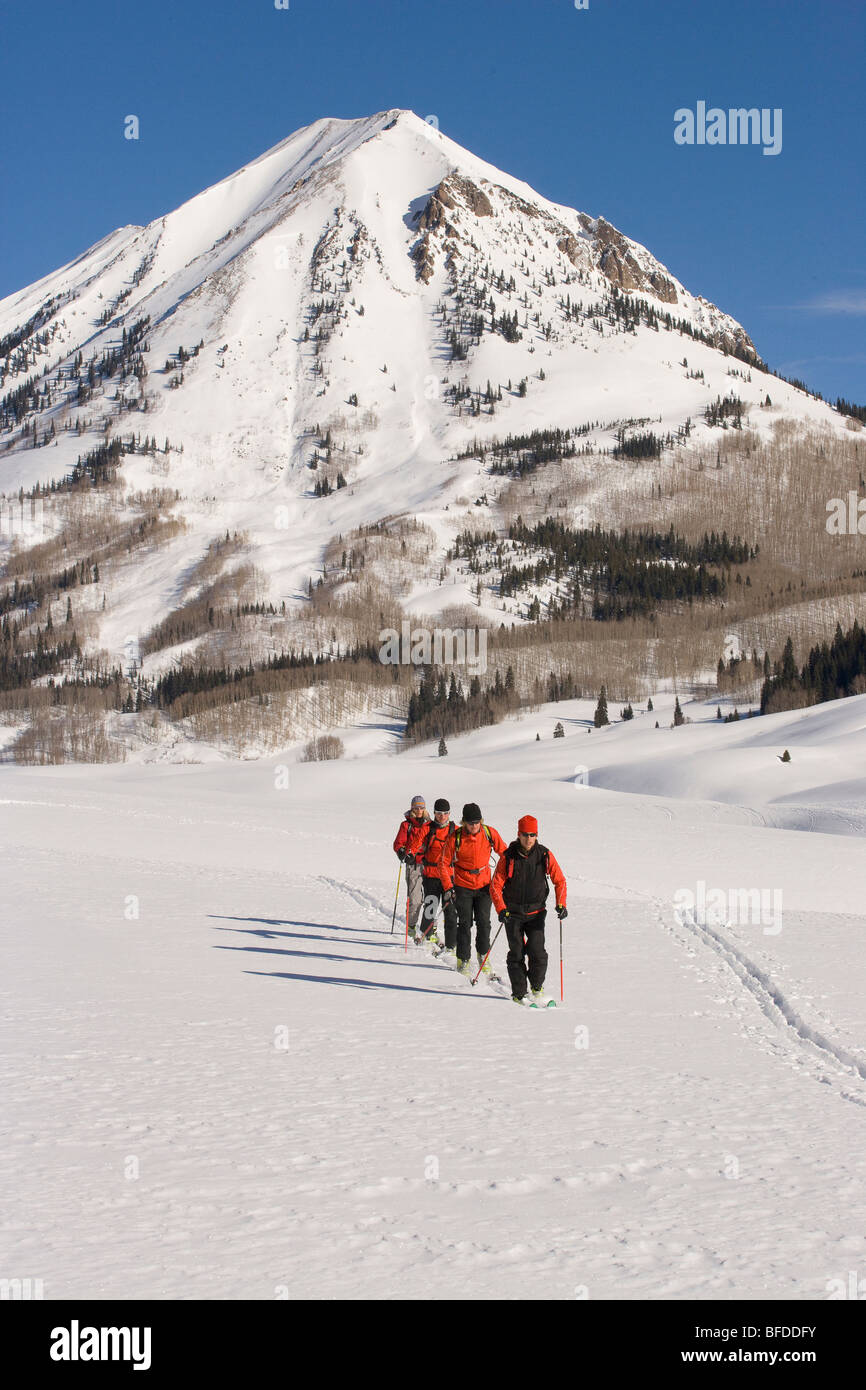 Four skiers alpine touring in Colorado Stock Photo - Alamy