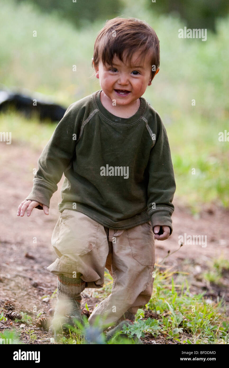 Fourteen month old plays by campsite. Fravert Basin. Backpacking Maroon ...