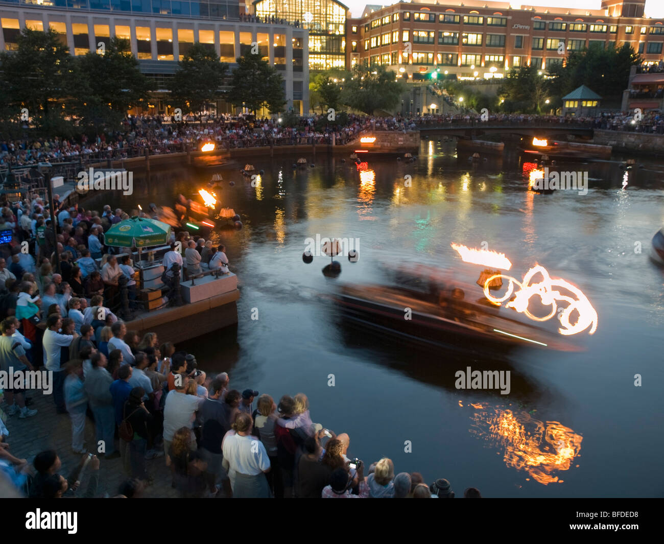 Crowds gather for Waterfire, performance art on the river at twilight ...
