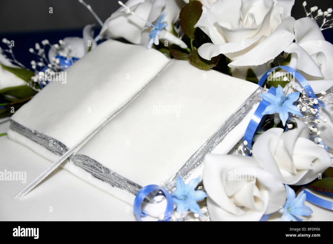 Book and flowers made from icing Stock Photo - Alamy