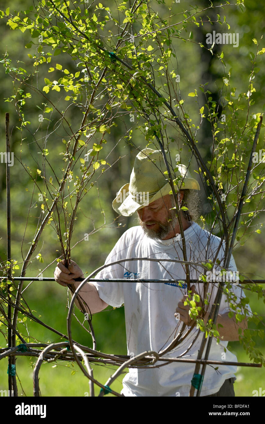 This is a chair being made from hazel stems grafted together and then ...