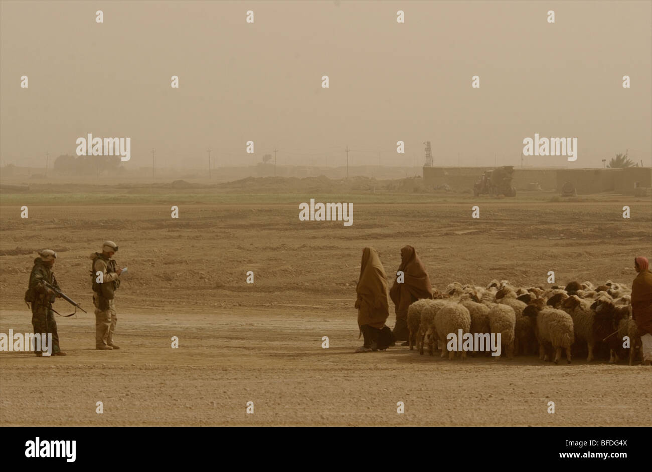 Military meet sheep herders Stock Photo - Alamy
