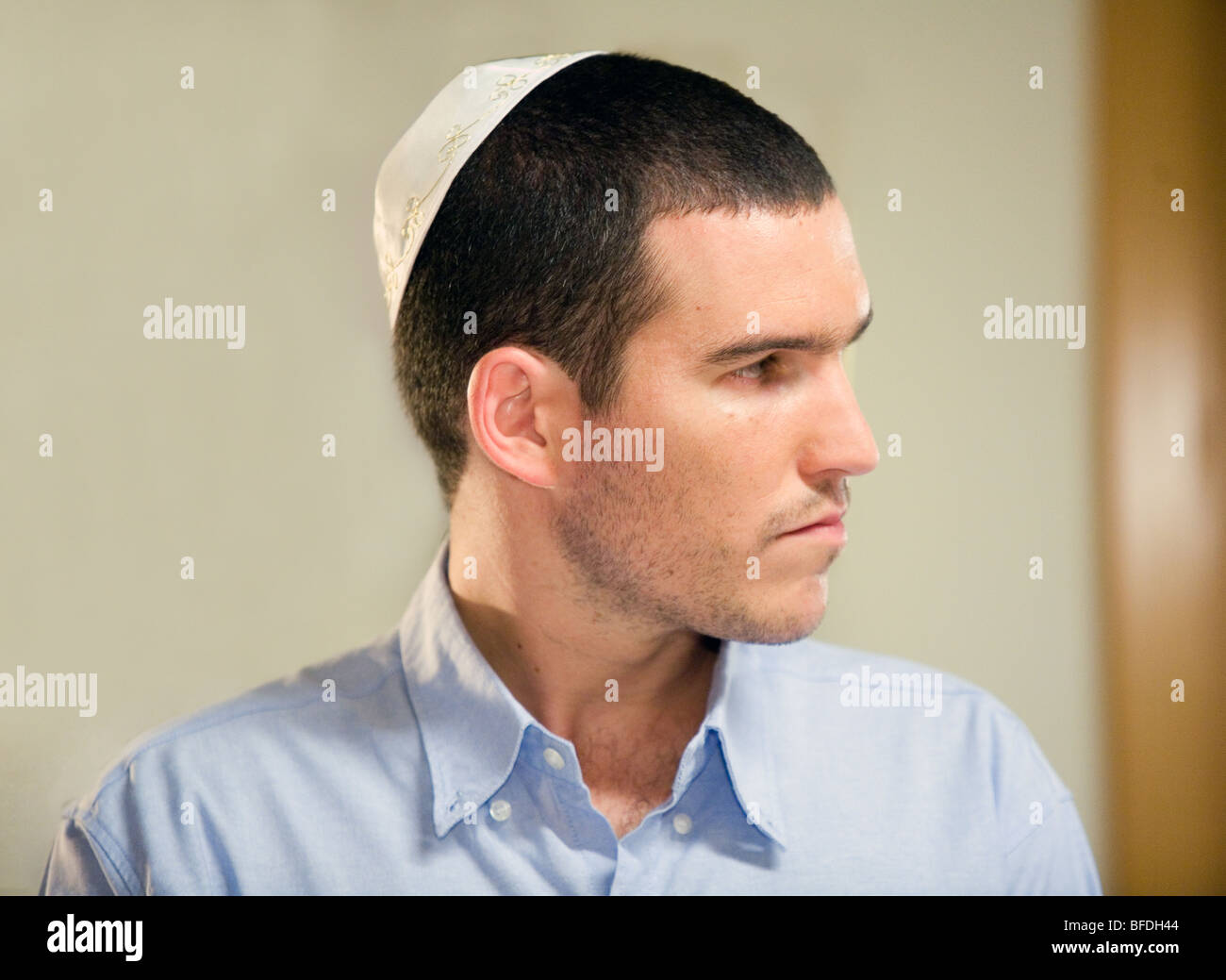 Young man wearing a skullcap Stock Photo - Alamy