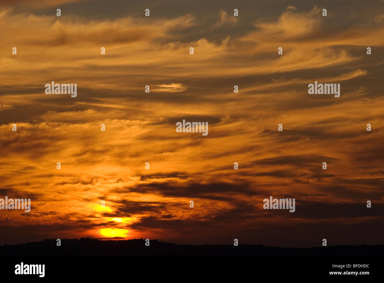 Fiery orange cloud abstract at sunset, Devon UK Stock Photo - Alamy