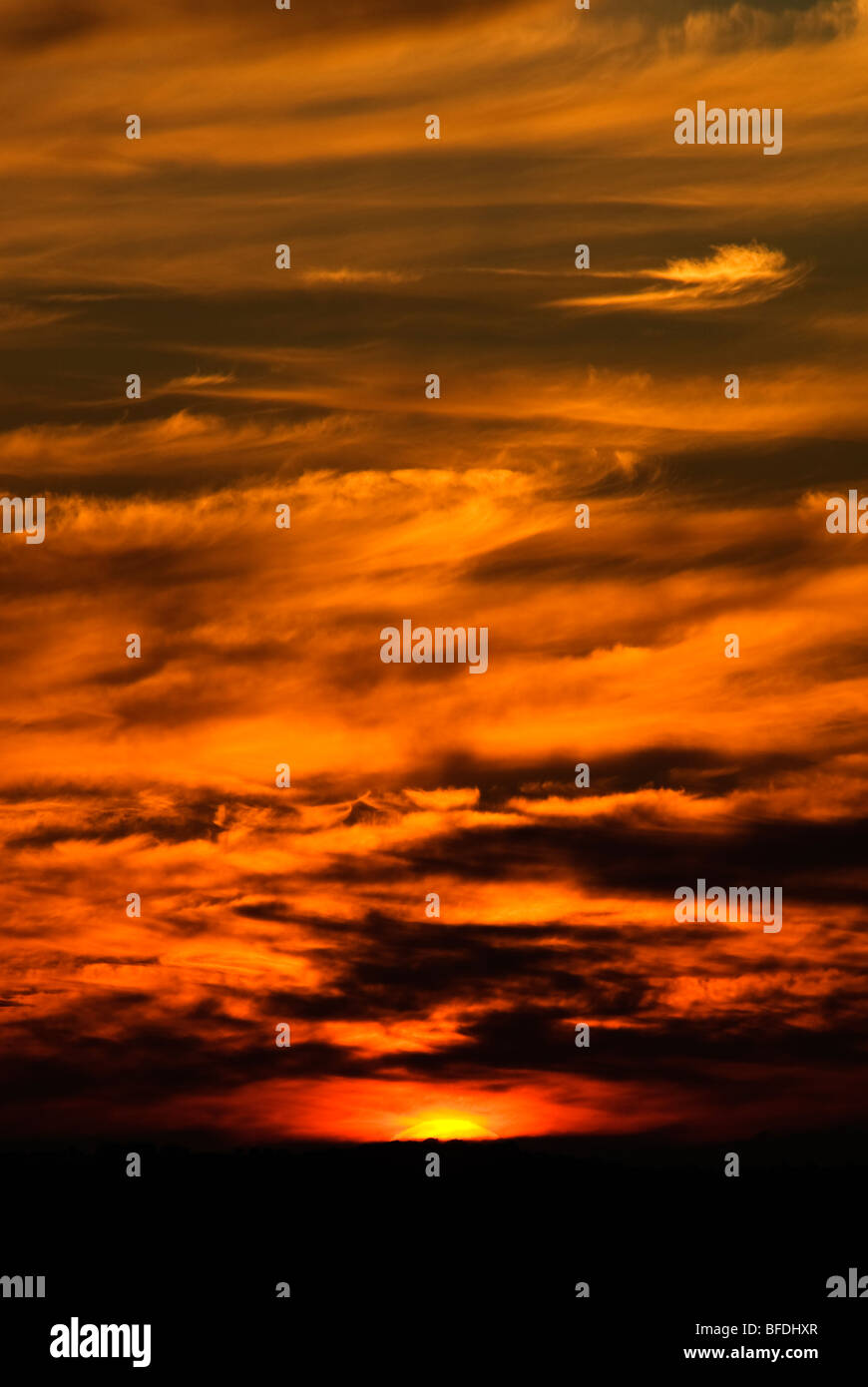 Fiery red cloud abstract at sunset, Devon UK Stock Photo - Alamy