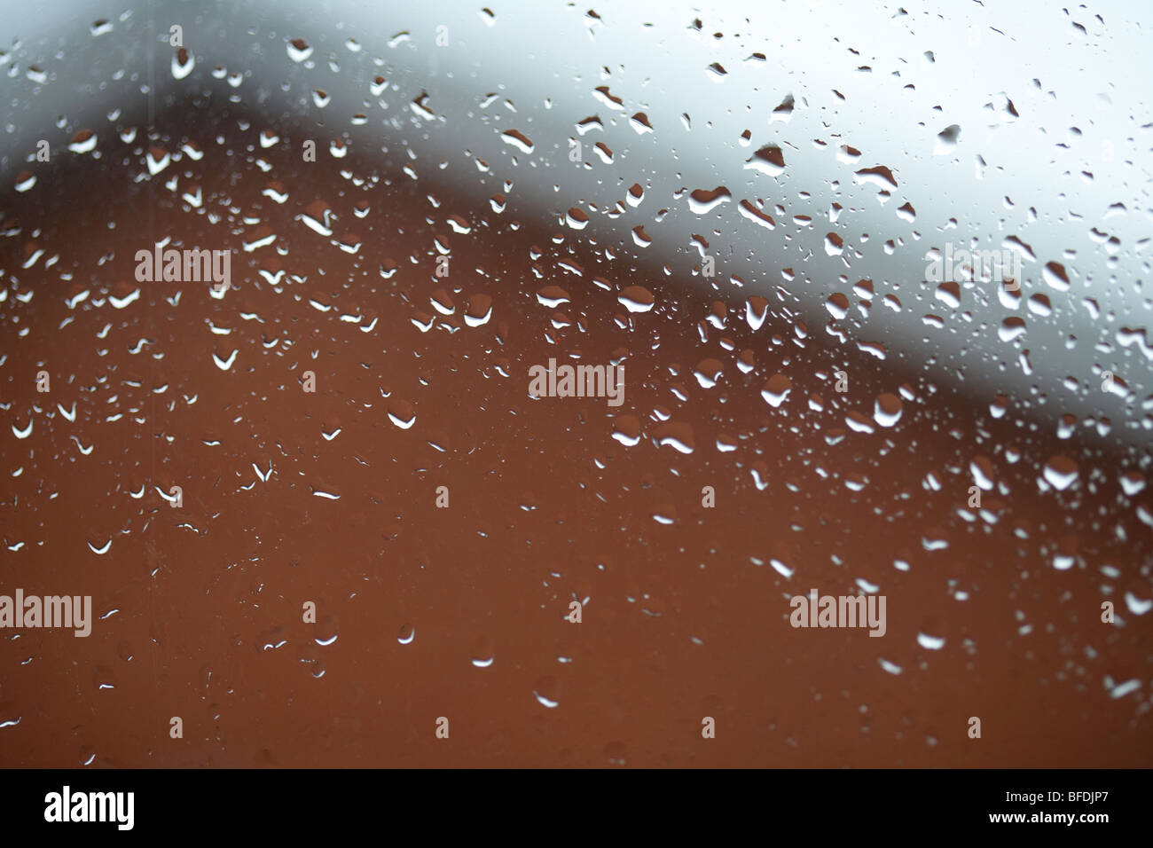 looking out of a window on a cold rainy day in the uk Stock Photo - Alamy
