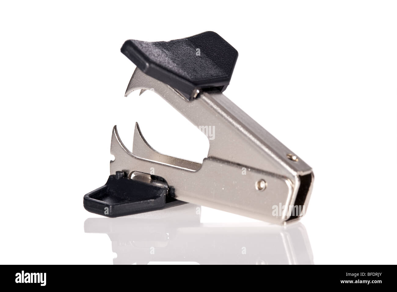 Staple remover isolated on a white background Stock Photo - Alamy