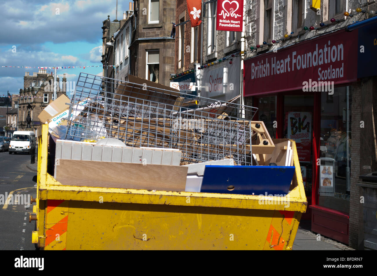 Waste skip in Scottish town of Hawick with shopfittings thrown away ...