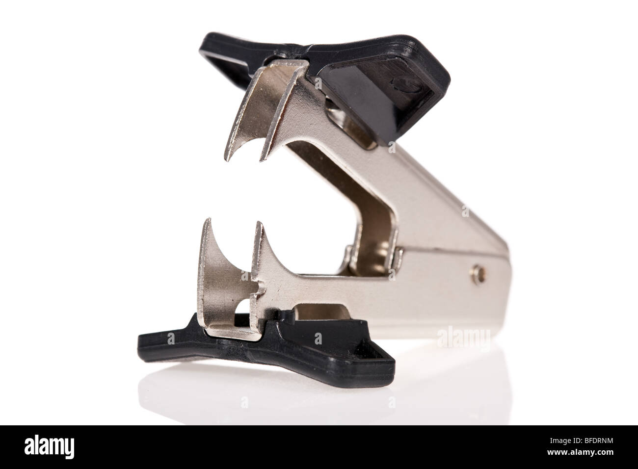Staple remover isolated on a white background Stock Photo - Alamy