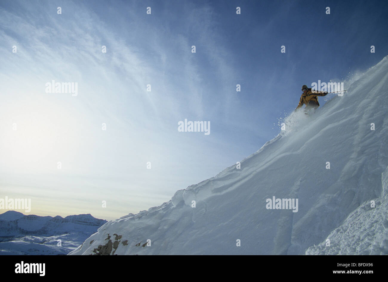 A skier making some powder turns at Sunshine Village, Banff National ...