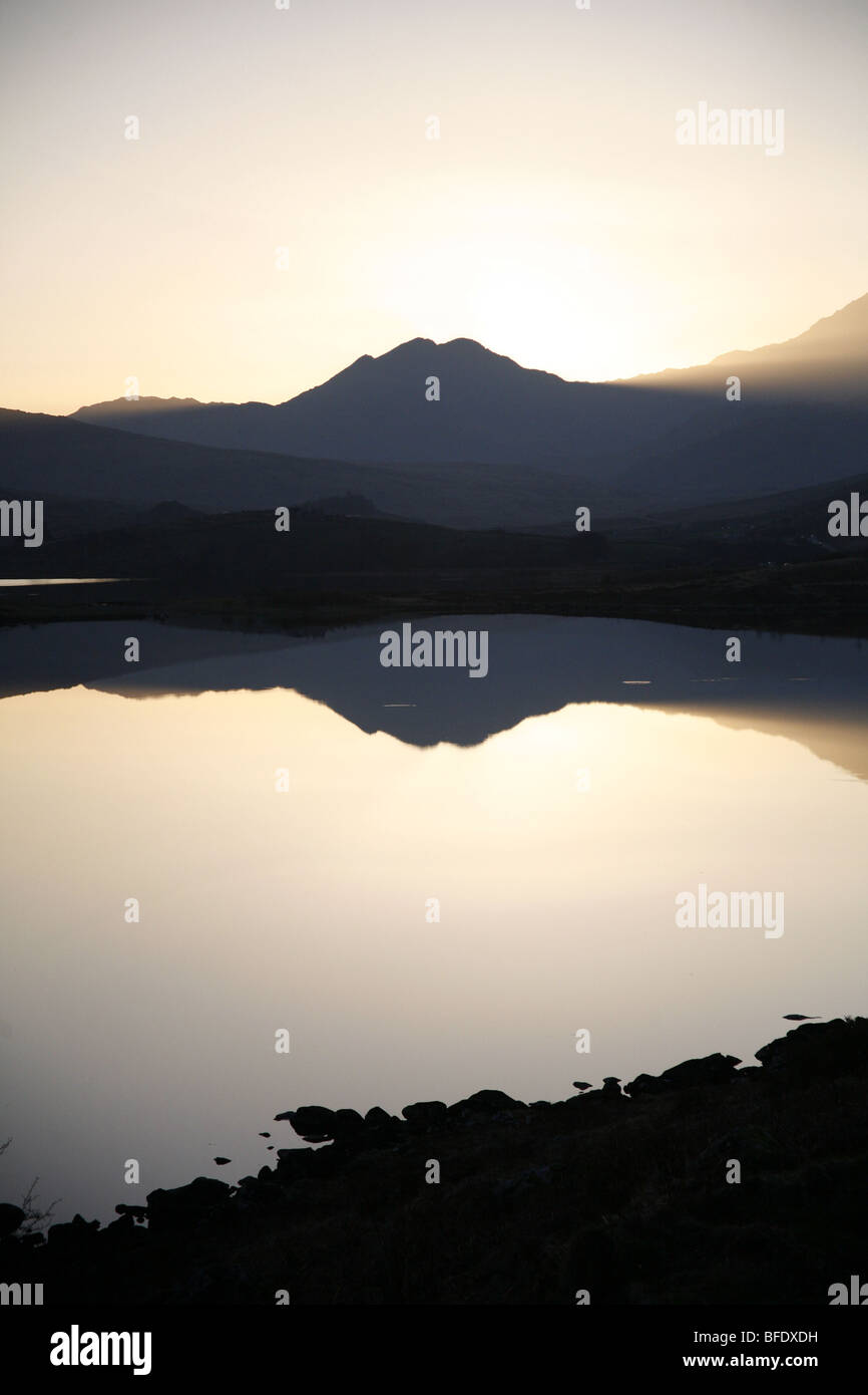 Snowdonia mountain silhouettes snowdonia wales hi-res stock photography ...