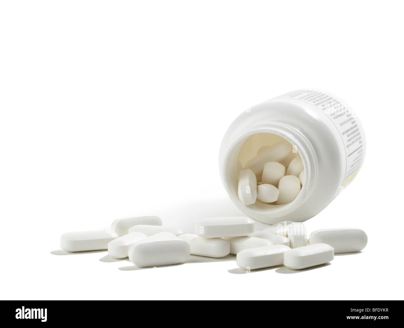 Spilled bottle of tablets Stock Photo - Alamy