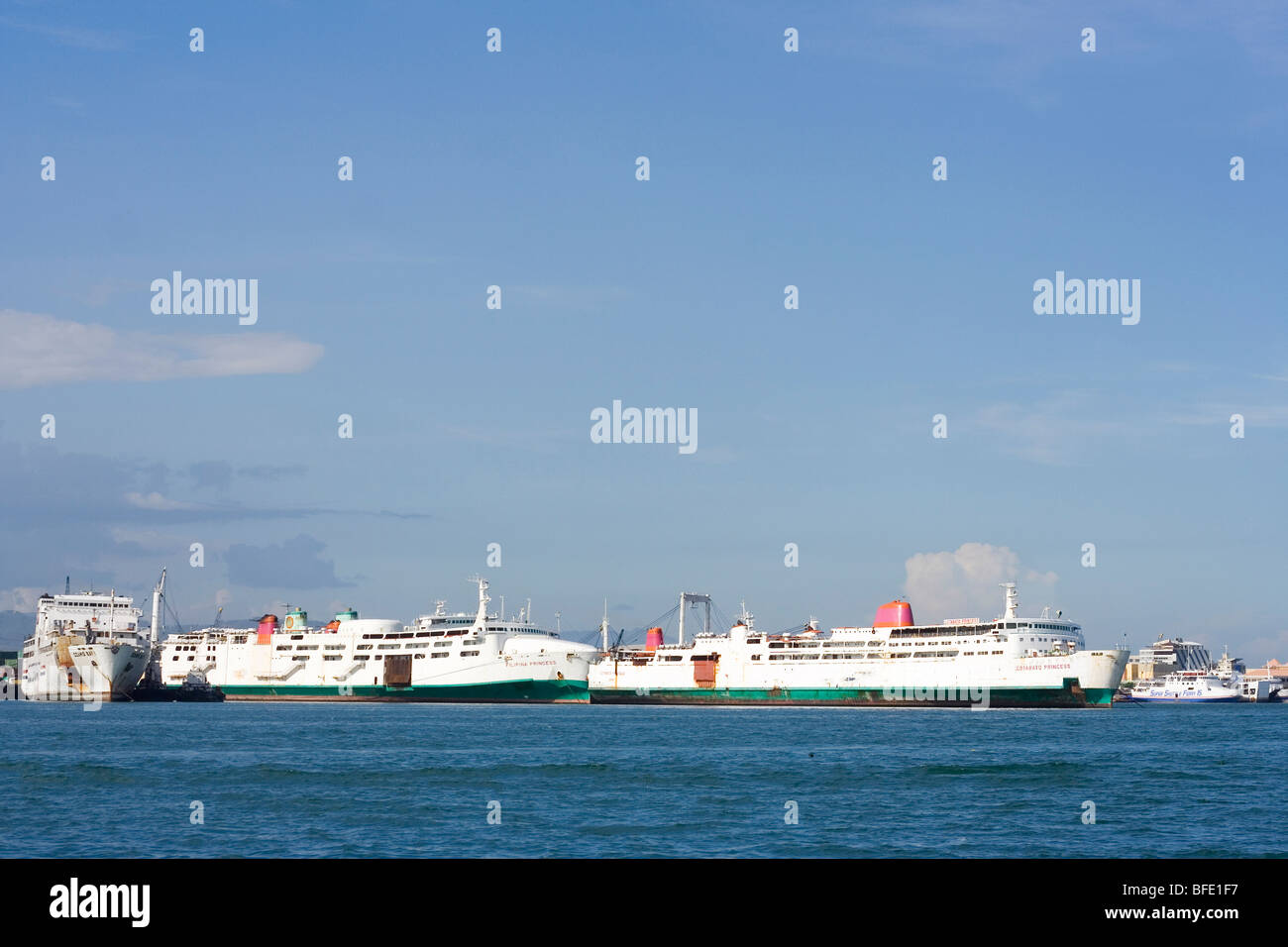 Boats along the Mactan Channel in Cebu Stock Photo - Alamy