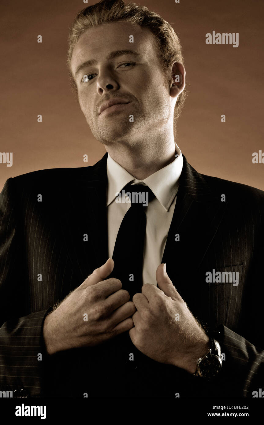 Half length portrait of a man in suit Stock Photo - Alamy