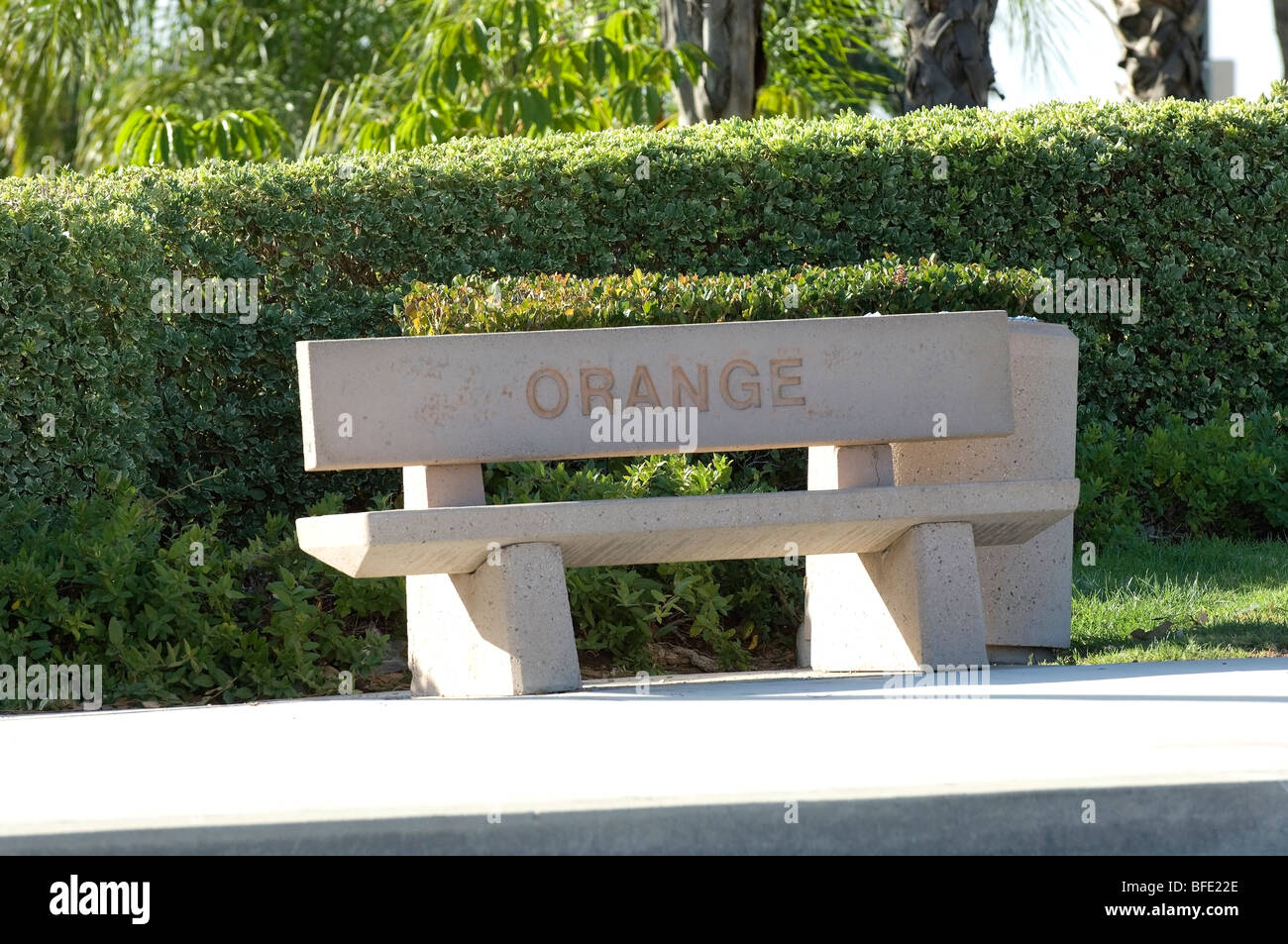 Concrete park bench with the word "Orange" embedded in it Stock Photo ...