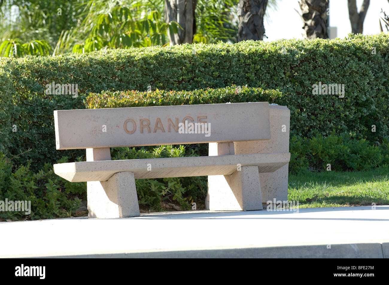 Concrete park bench with the word "Orange" embedded in it Stock Photo ...