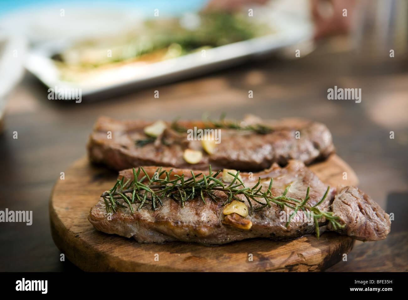 Steak on wooden tray Stock Photo - Alamy