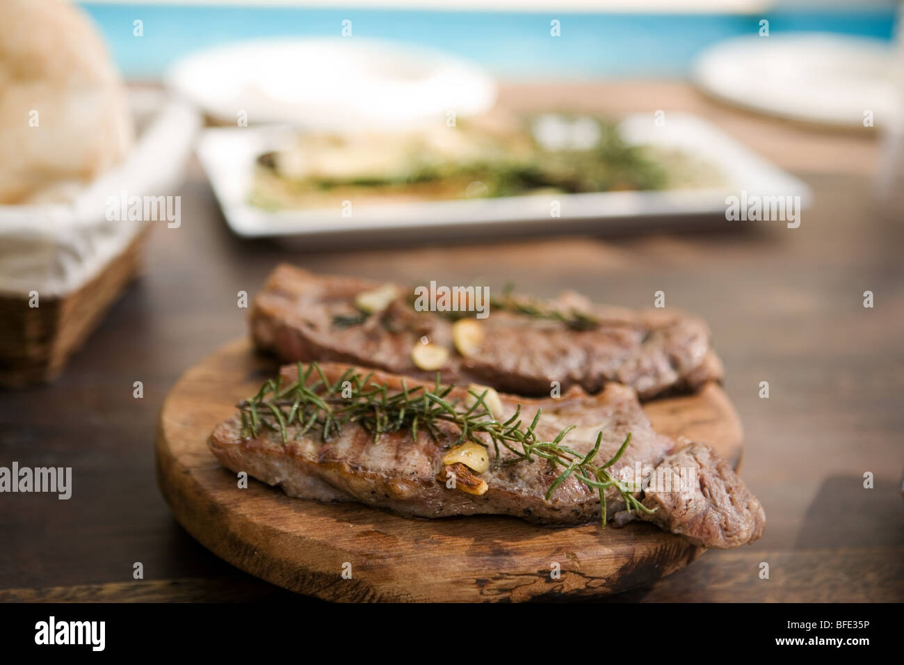 Steak on wooden tray Stock Photo - Alamy