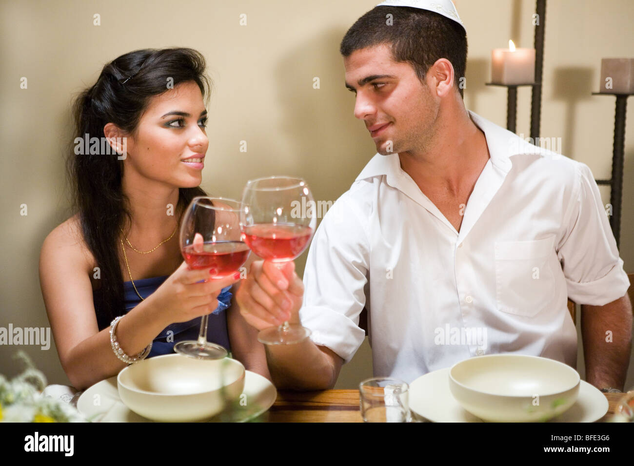 Young man and woman at Seder Night Stock Photo - Alamy