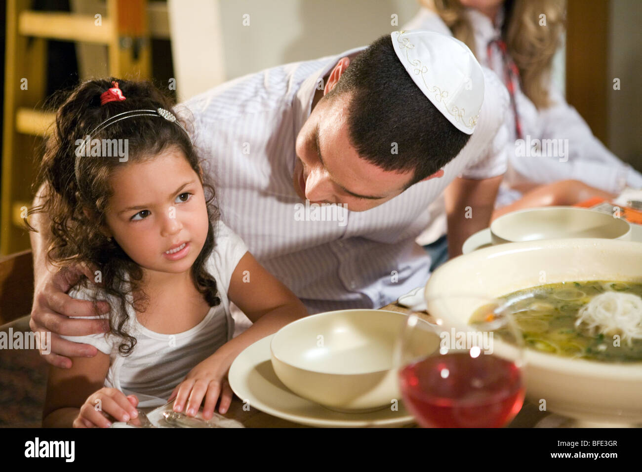 Young man and child at Seder Night Stock Photo - Alamy