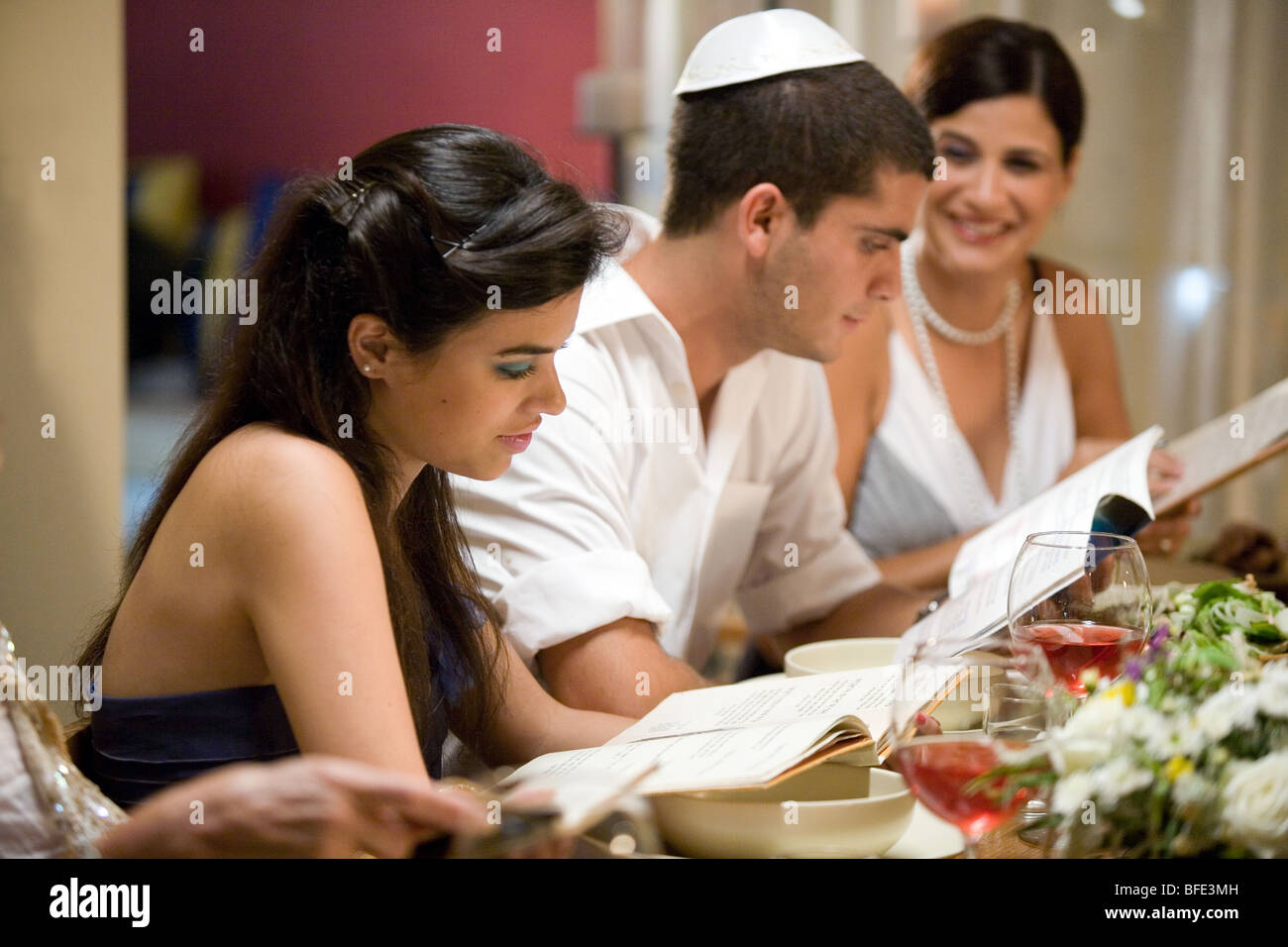 Reading the Haggadah Stock Photo - Alamy