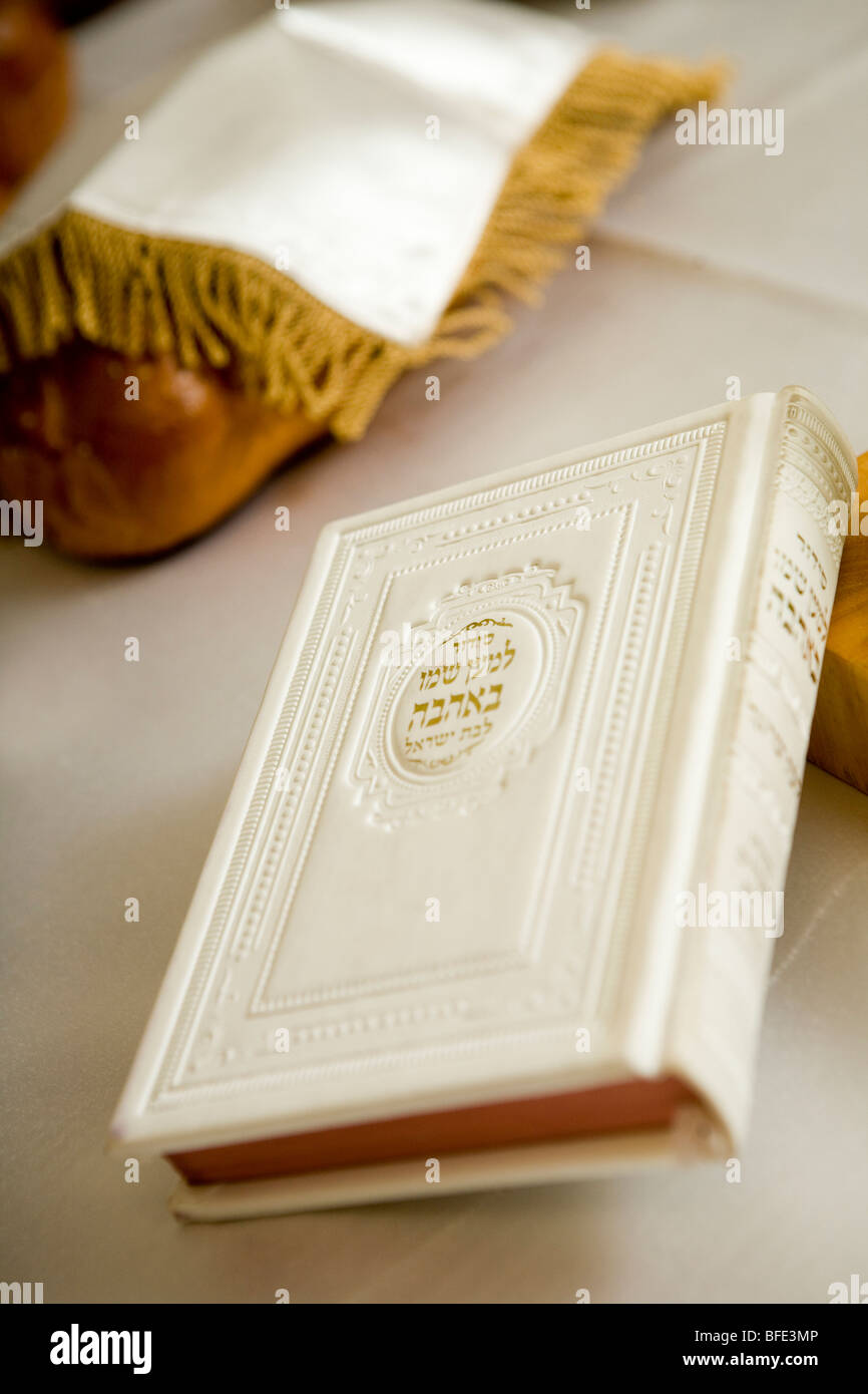 Jewish prayer book on a festive dinner table Stock Photo - Alamy