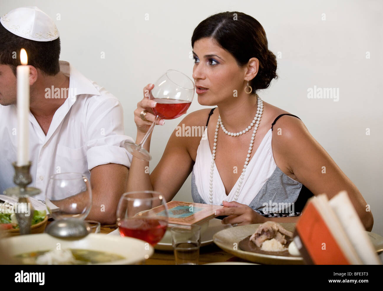 Woman at Seder Night Stock Photo - Alamy