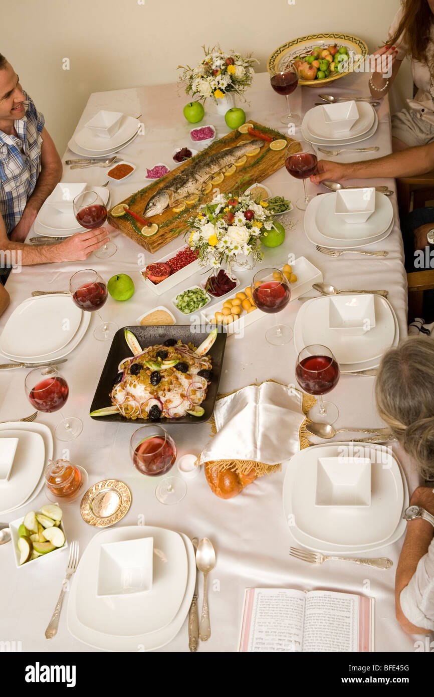 High angle view of a family at a festive dinner table Stock Photo - Alamy
