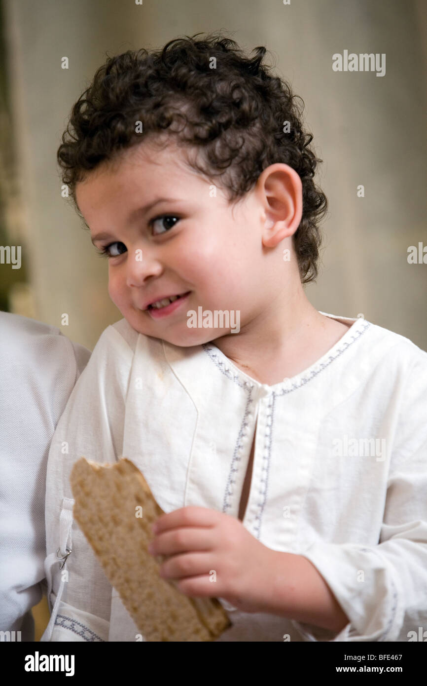 Child eating Matzah Stock Photo - Alamy