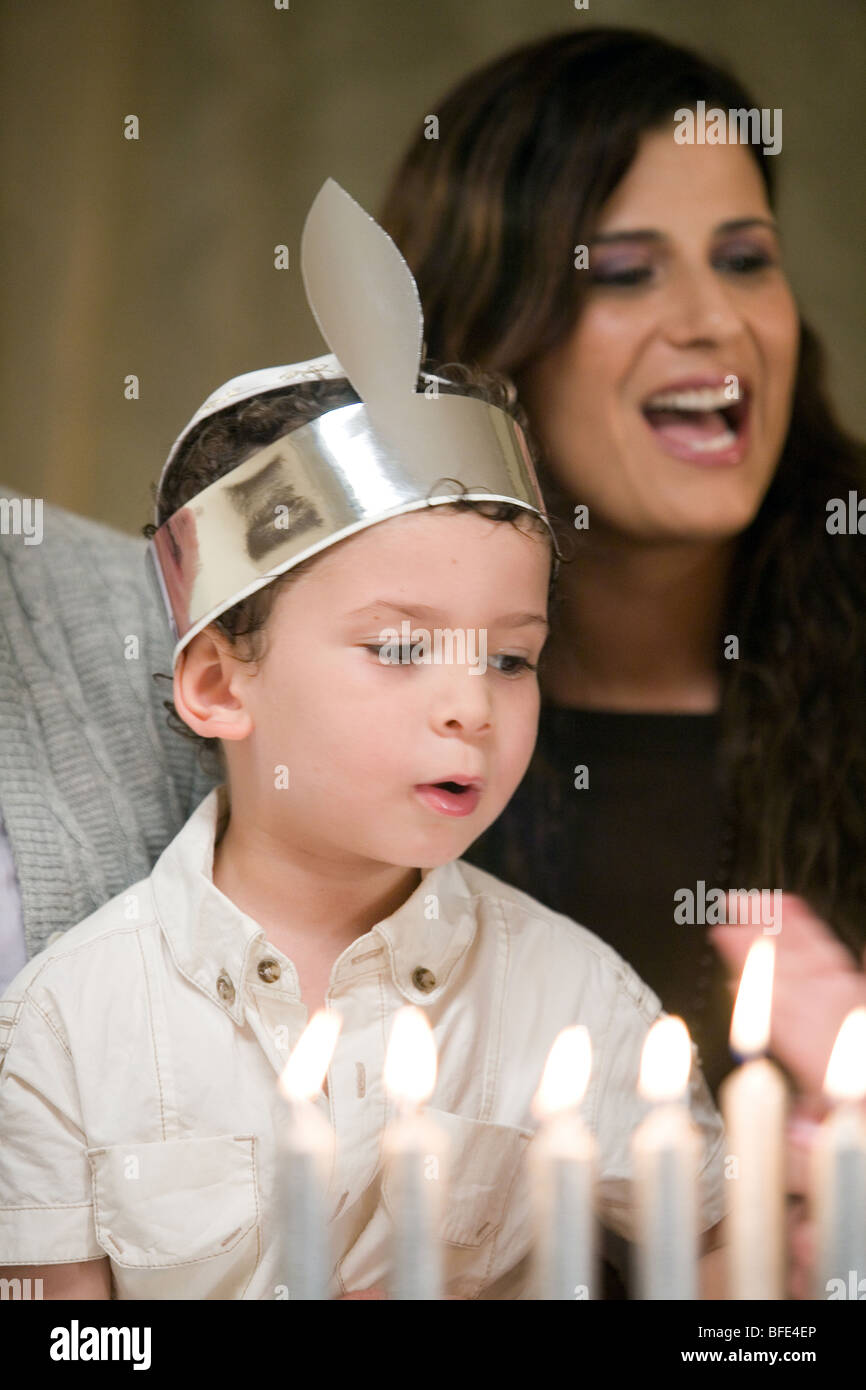 Candle lighting blessings menorah hi-res stock photography and images ...