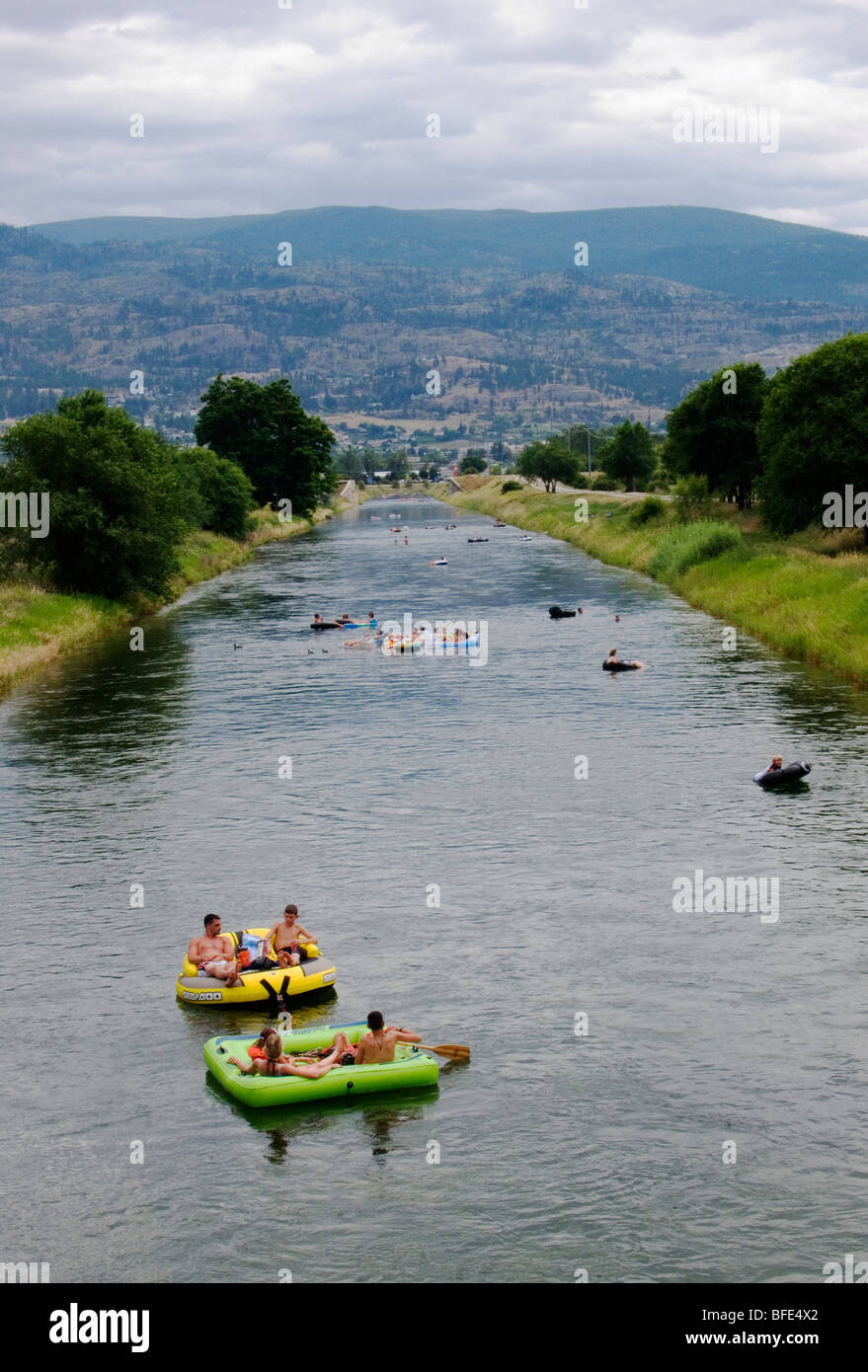 Rafters drift the Okanagan River Channel at Penticton, in the Okanagan ...
