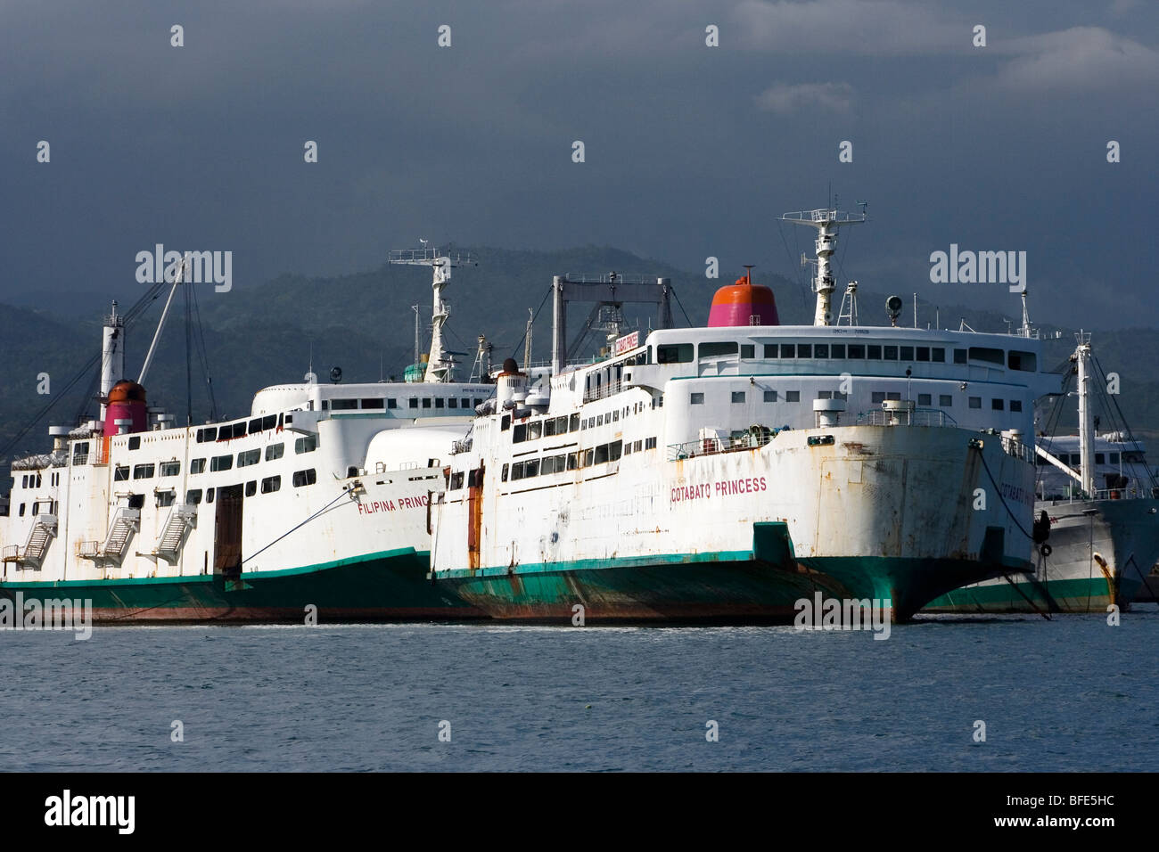 Boats along the Mactan Channel in Cebu Stock Photo - Alamy
