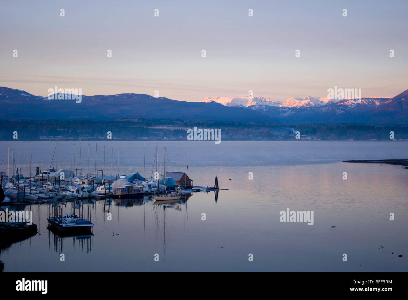 Boats in marina, Comox Bay, Comox Glacier in background, Comox Valley ...