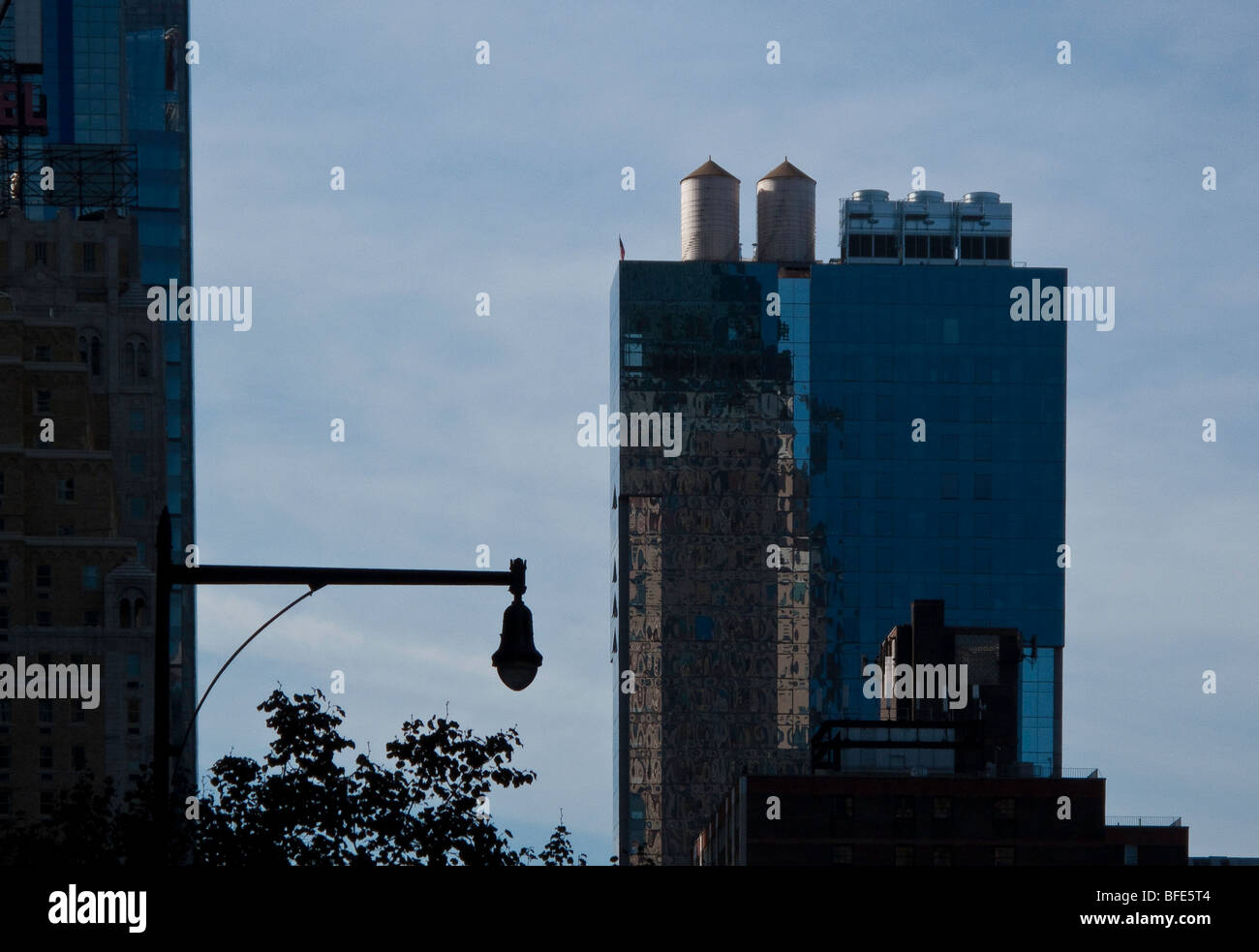 Water tanks an ever present sight in New York City, stand out atop a ...